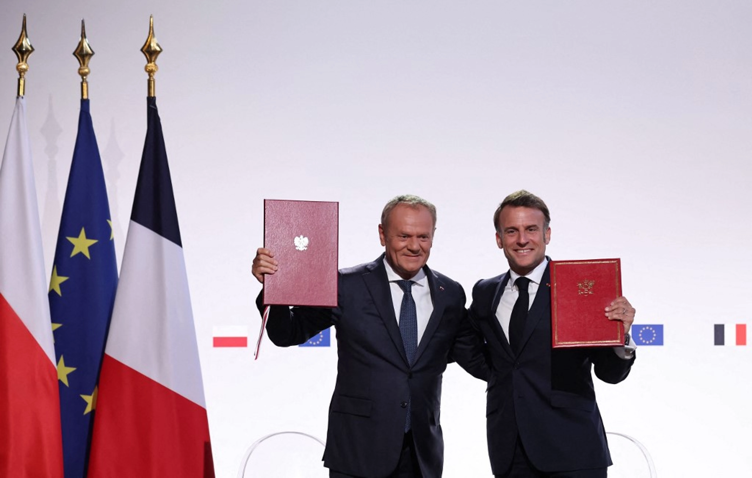 France, Poland Sign Treaty With Mutual Defense Pledge